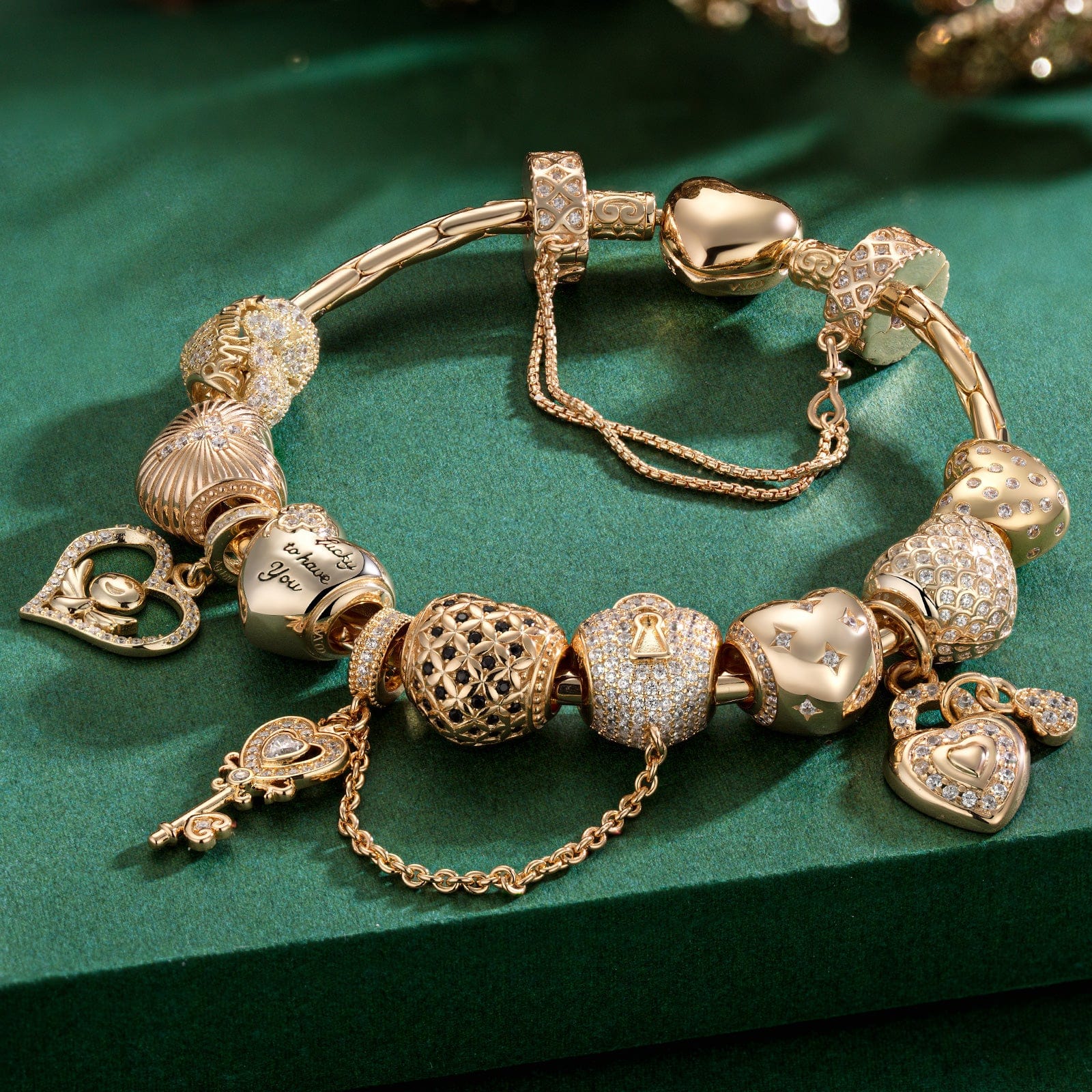 STERLING SILVER GOLDEN HEART CHARMS BRACELET SET IN 14K GOLD PLATED – GONA