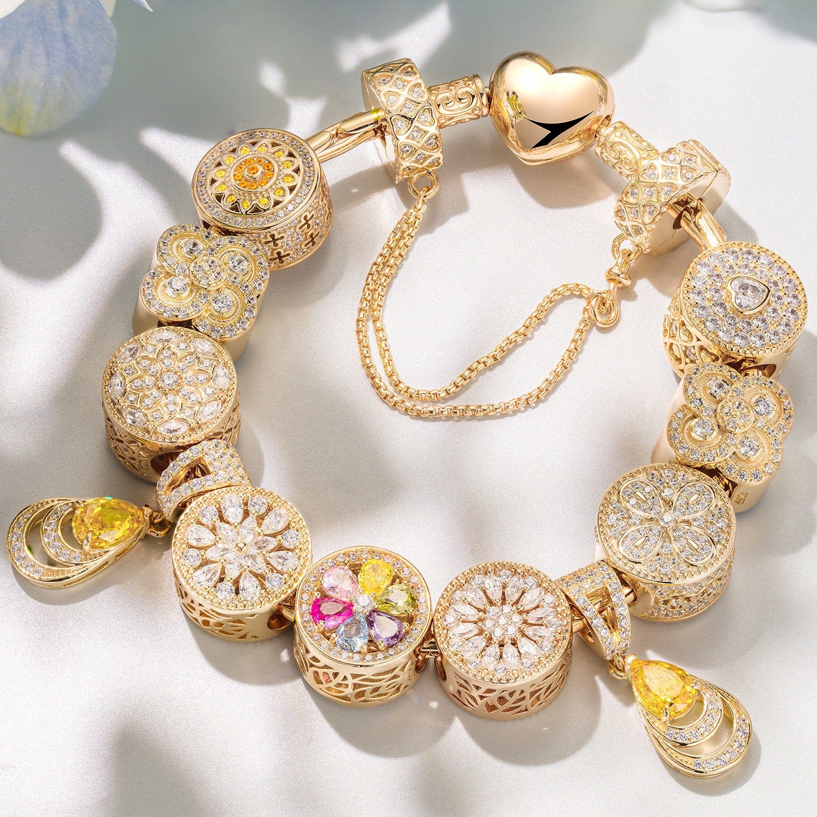 STERLING SILVER BLOOMING PETALS OF LOVE CHARMS BRACELET SET IN 14K GOL ...