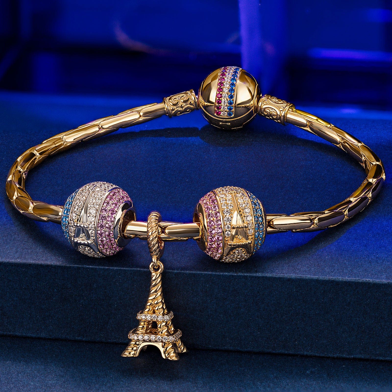 STERLING SILVER PARIS SYMBOL CHARMS BRACELET SET, FEATURING DUAL PLATI ...